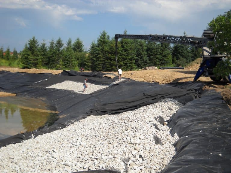 Rip rap conveyor system - Wisconsin Lake & Pond